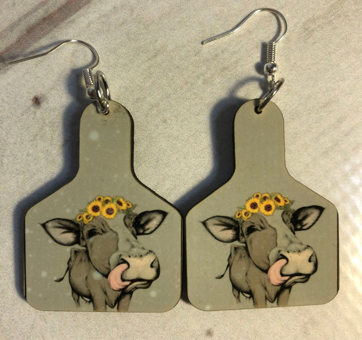 Cow tag earrings store
